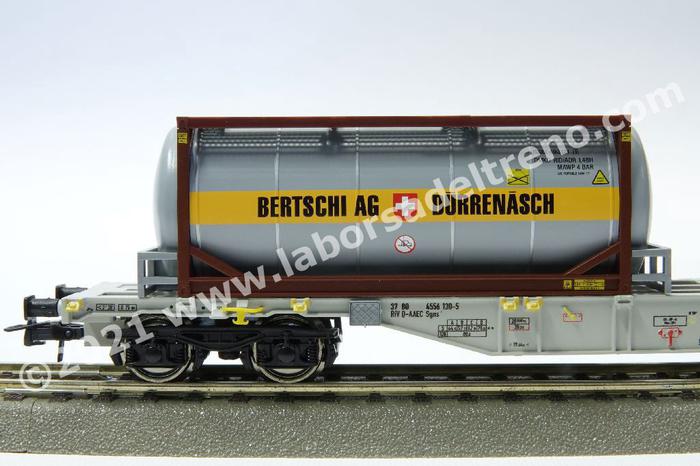 Roco - 77340 Carro pianale a carrelli DB AG AAE tipo Sgns caricato con ...