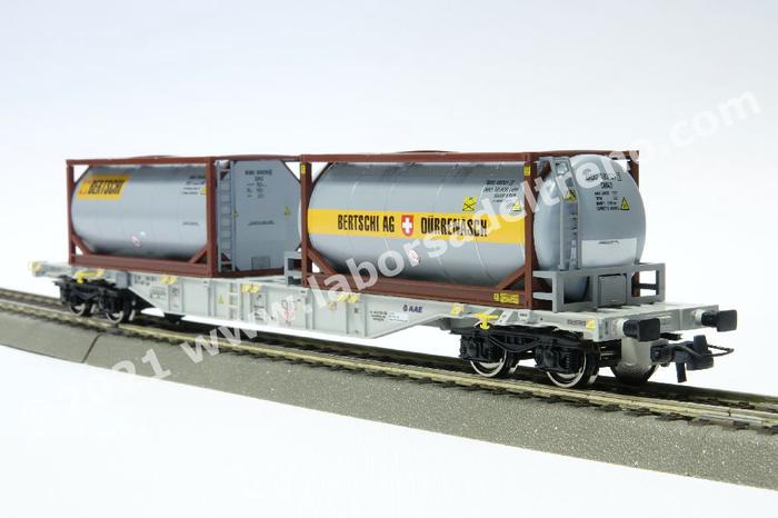 Roco - 77340 Carro pianale a carrelli DB AG AAE tipo Sgns caricato con ...